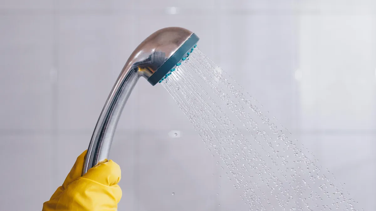 How To Clean A Shower Head Eliminate Mineral Deposits
